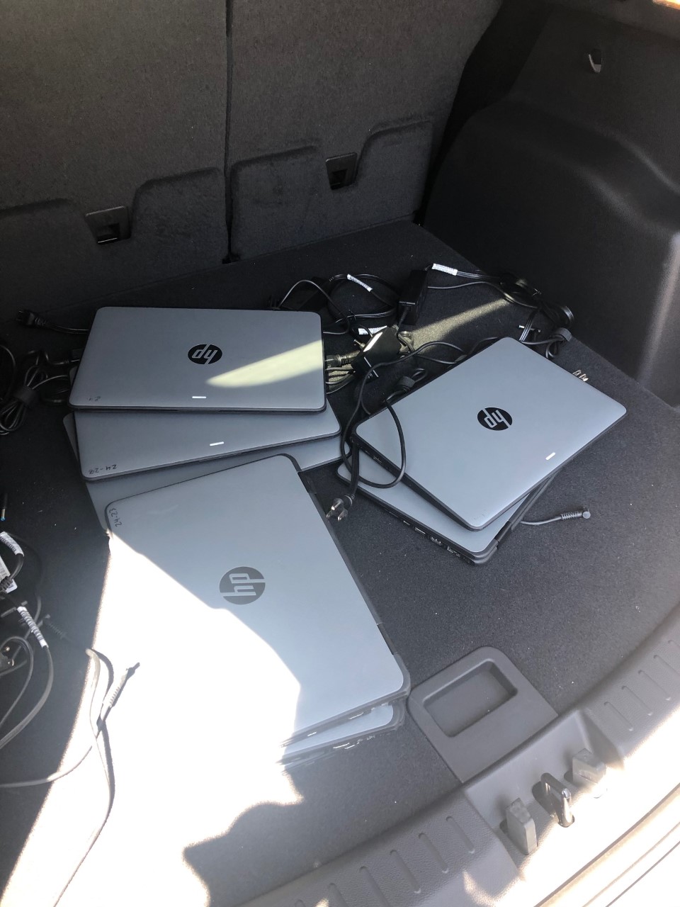 West High School in Salt Lake City handing out laptops to students ...