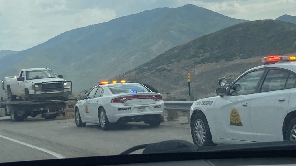 Major Utah road closed after police chase for shooting suspect