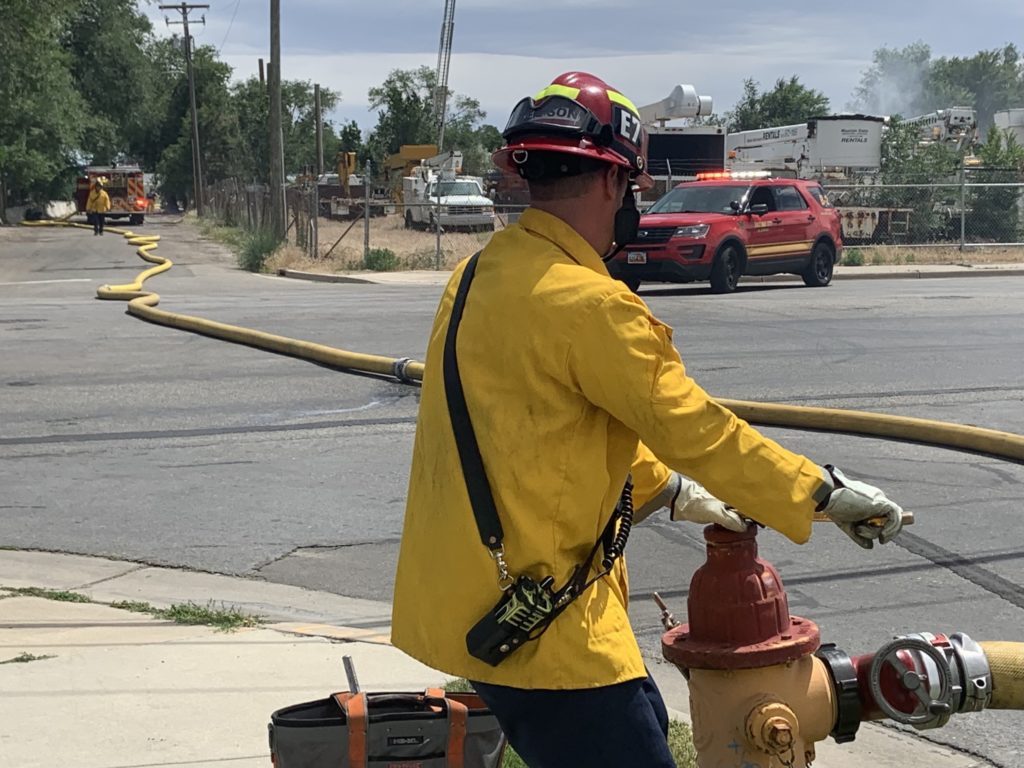 Barrels explode in grass fire in Salt Lake City, hazmat crews investigate