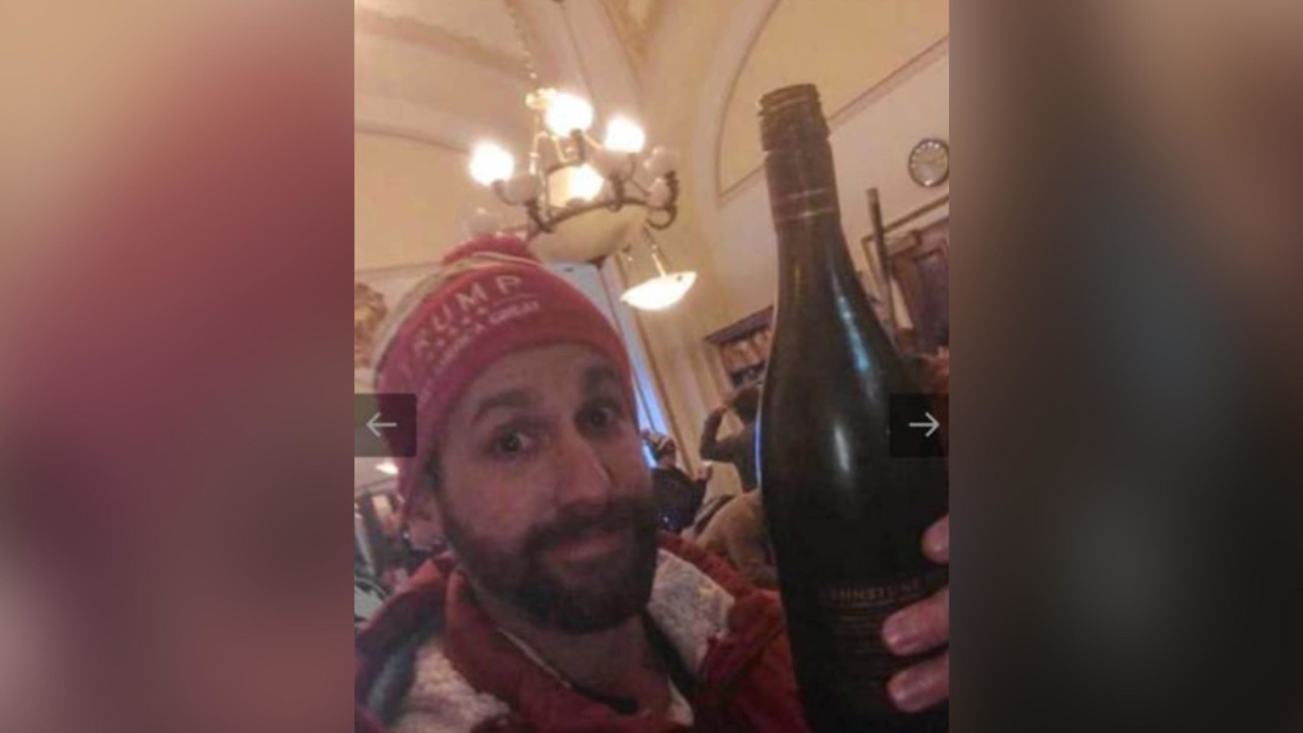 Man photographed 'chugging wine' in the US Capitol on January 6 ...