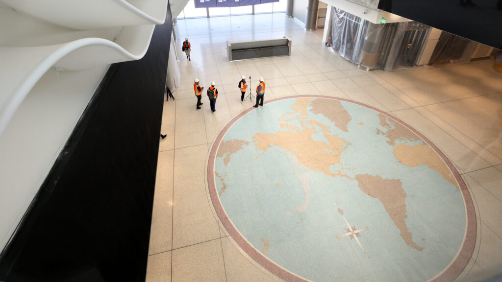 Iconic World Map preserved in a new airport home